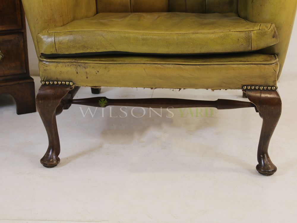 Vintage olive green leather button back chair