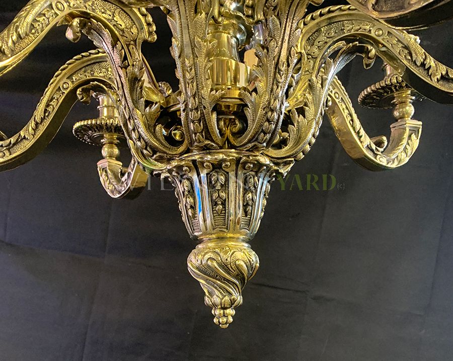 Decorative brass chandelier with cherub detailing