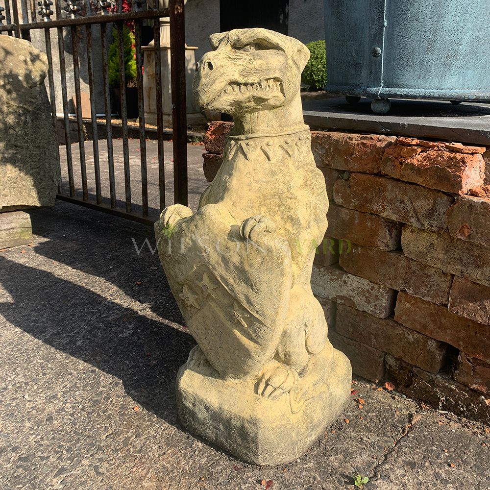 Pair of stone Griffin hounds