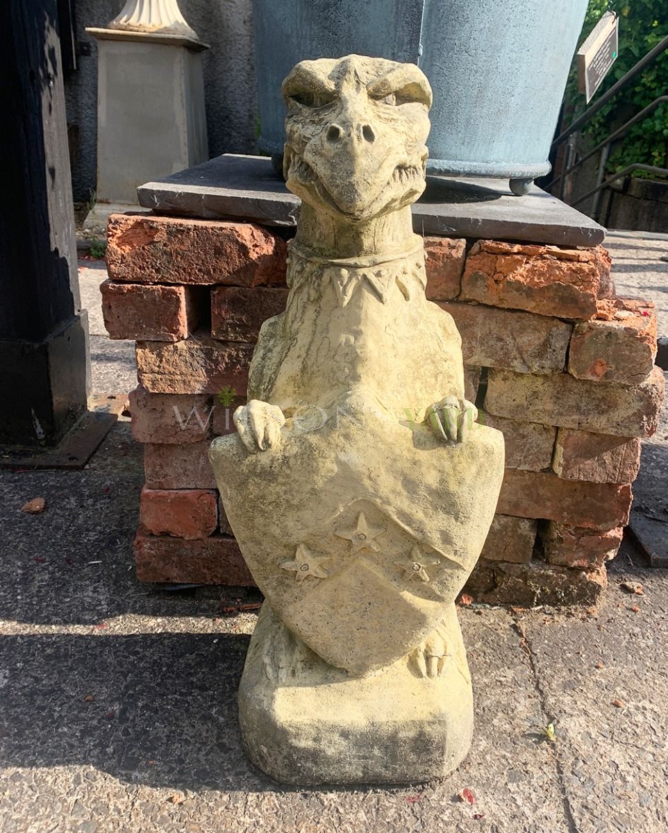 Pair of stone Griffin hounds