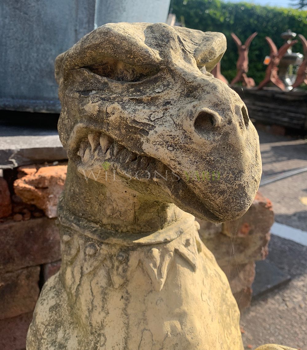 Pair of stone Griffin hounds