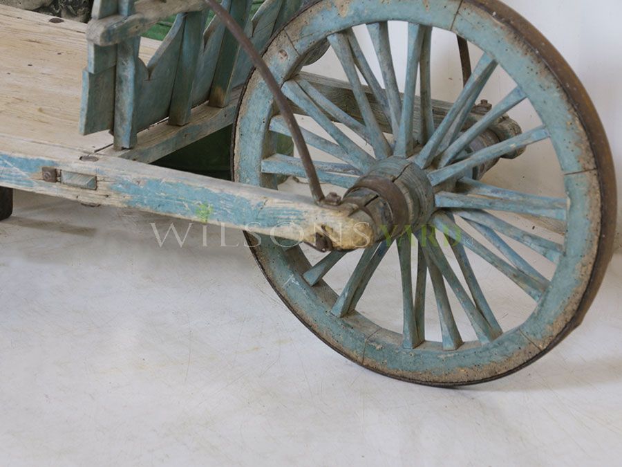 Antique wooden wheel barrow