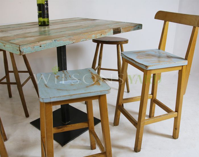Funky wooden distressed table with stools